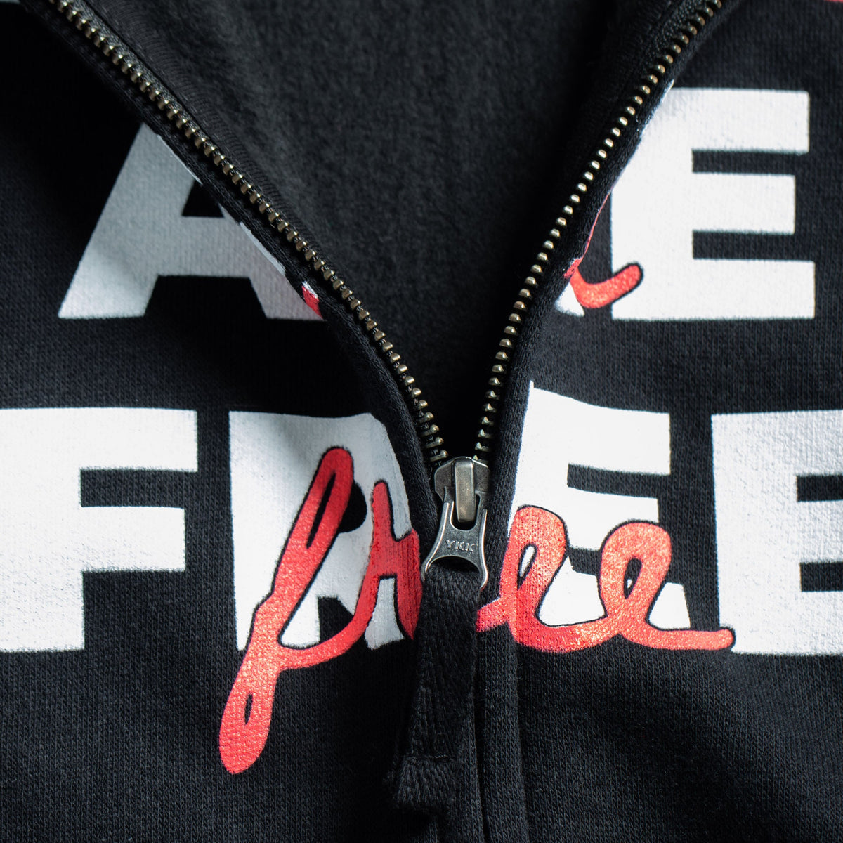 None Of Us Are Free Zip-Up Hoodie – Wear The Peace